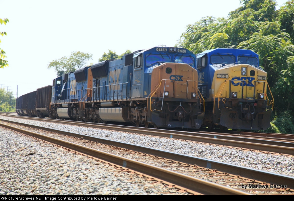 CSX 4766 & 312 head up two of six coal trains parked between Halethorpe and Mt.Winans