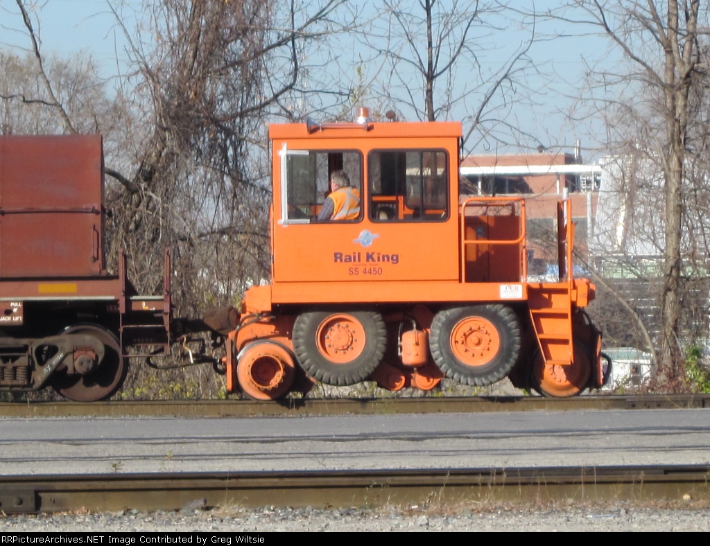 A Rail King Trackmobile pushes four coil cars into CP's Aberdeen Yard