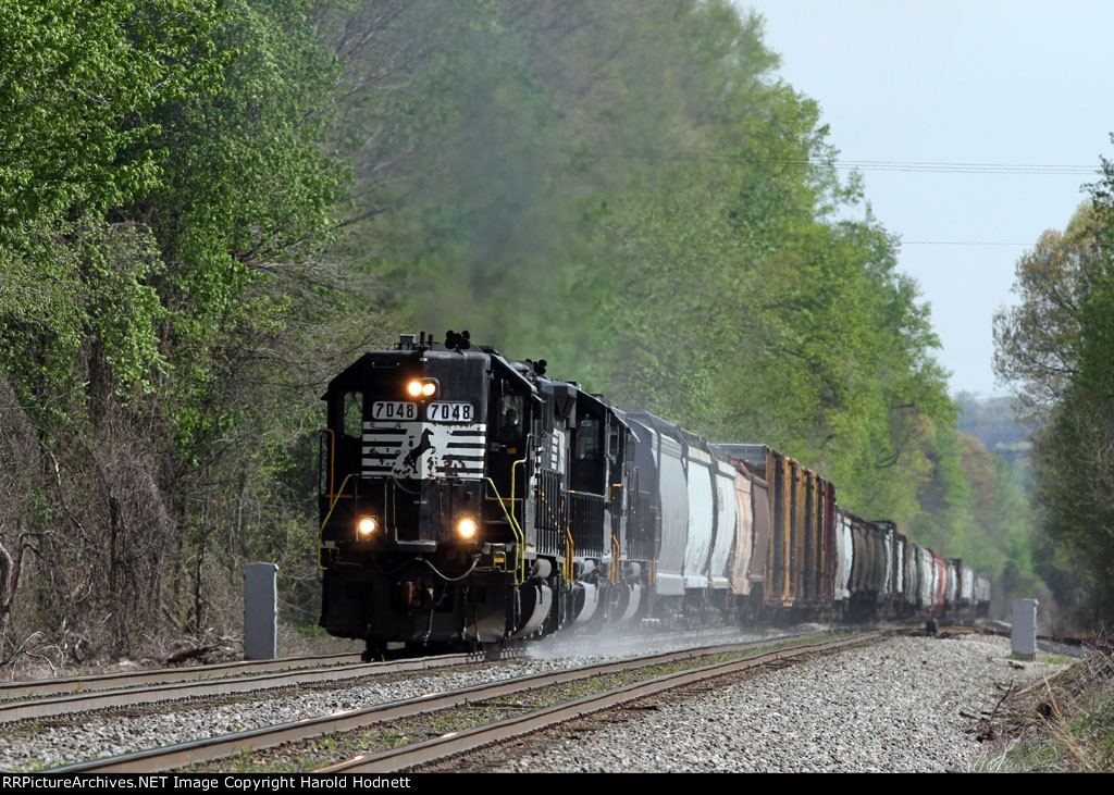 NS 7048 is sanding hard while leading train P61 up the hill towards Five Row