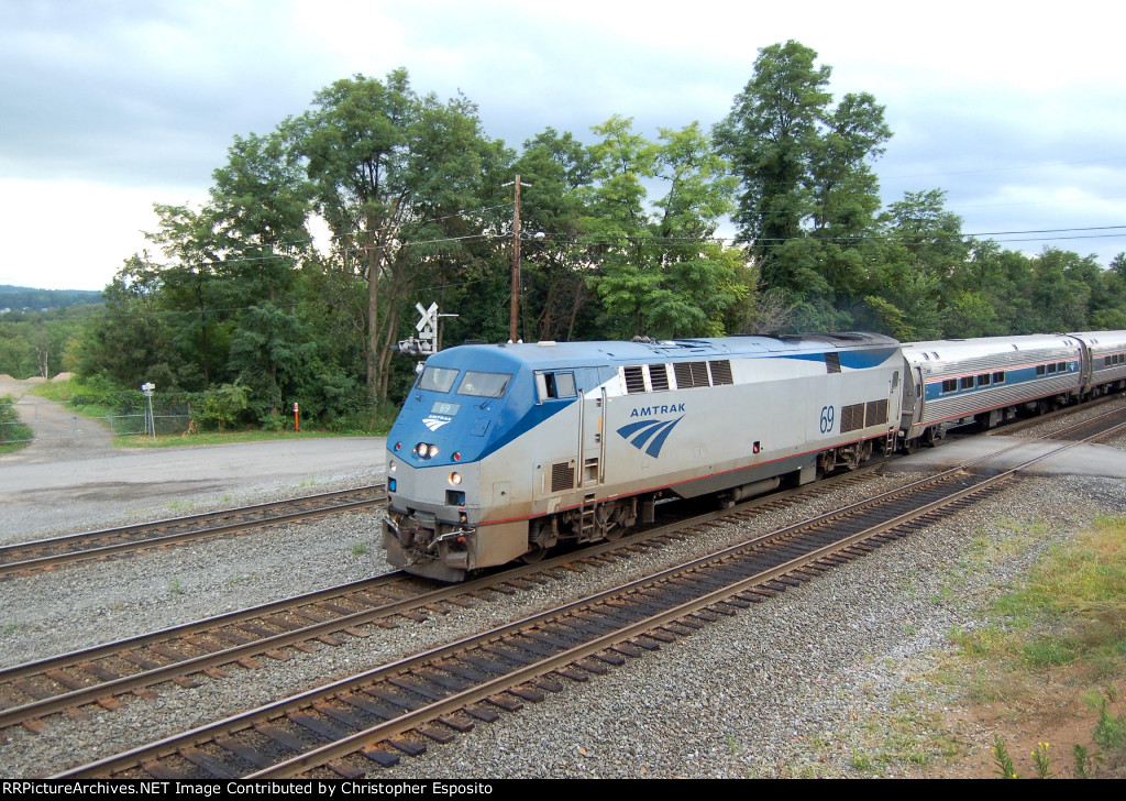 Amtrak P42 69 leads the eastbound Pennsylvanian past the brickyard