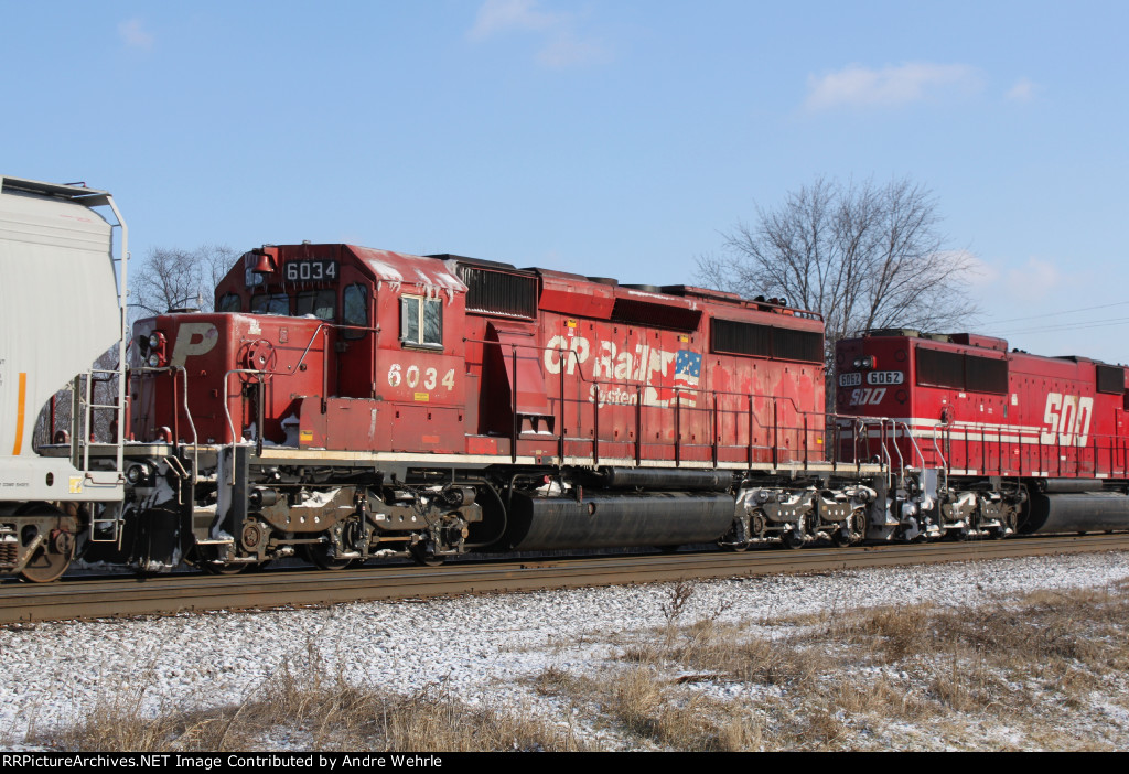CP 6034 trails on 282