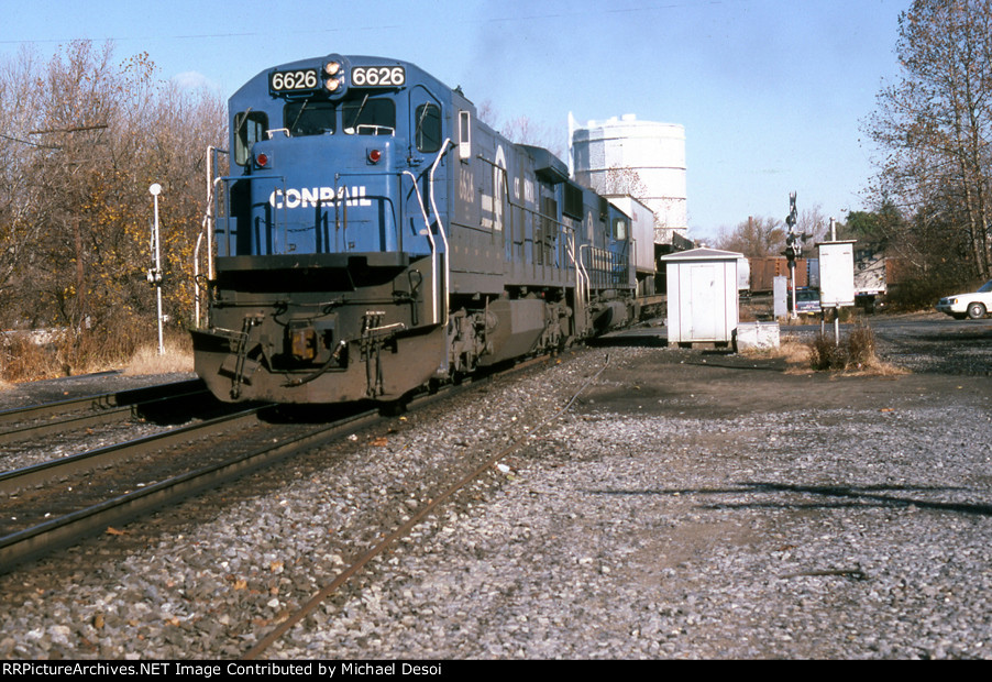 CR C36-7 #6626 leads a westbound at CP Burn
