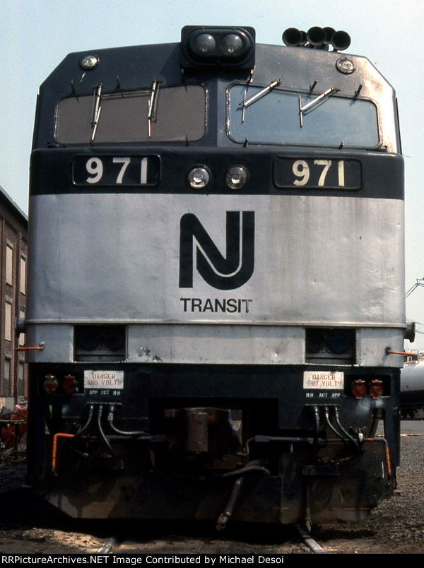 NJT E-60-CP #971 sits beside the shop