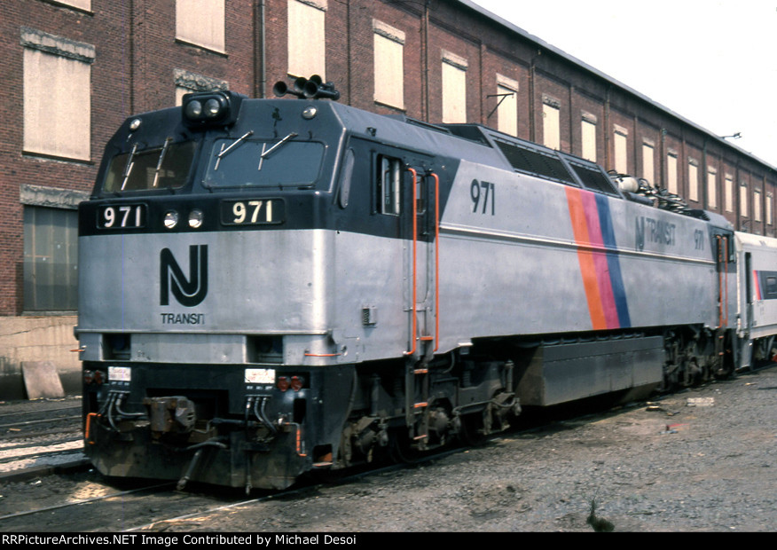 NJT E-60-CP #971 sits beside the shop