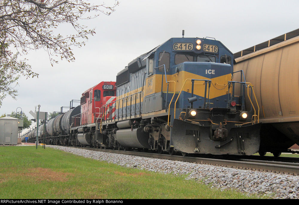 Passing an eastbound, a CP westbound empty ethanol train departs Bensenville yard and will soon ...