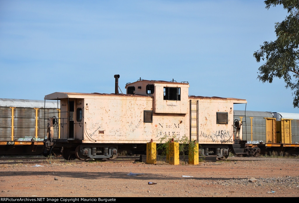 NdeM Caboose in Benjamin Hill yard