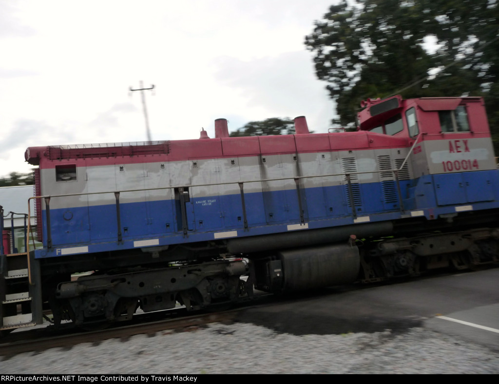 AEX (ex RailAmerica) 100014 (SW1500) trailing on CSX Q614-16