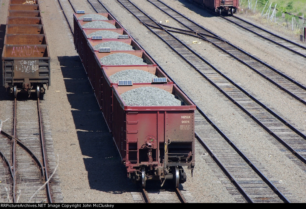 HZGX 9974 part of a short string of ballast cars