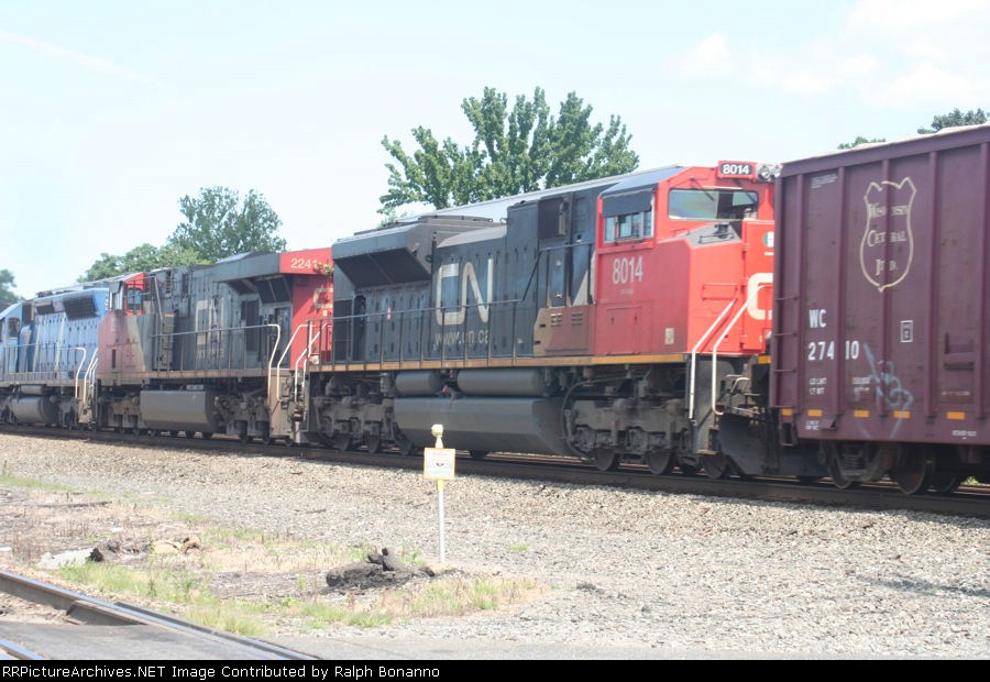 Q410 has this pair of CN visitors trailing, including a new SD70ACe