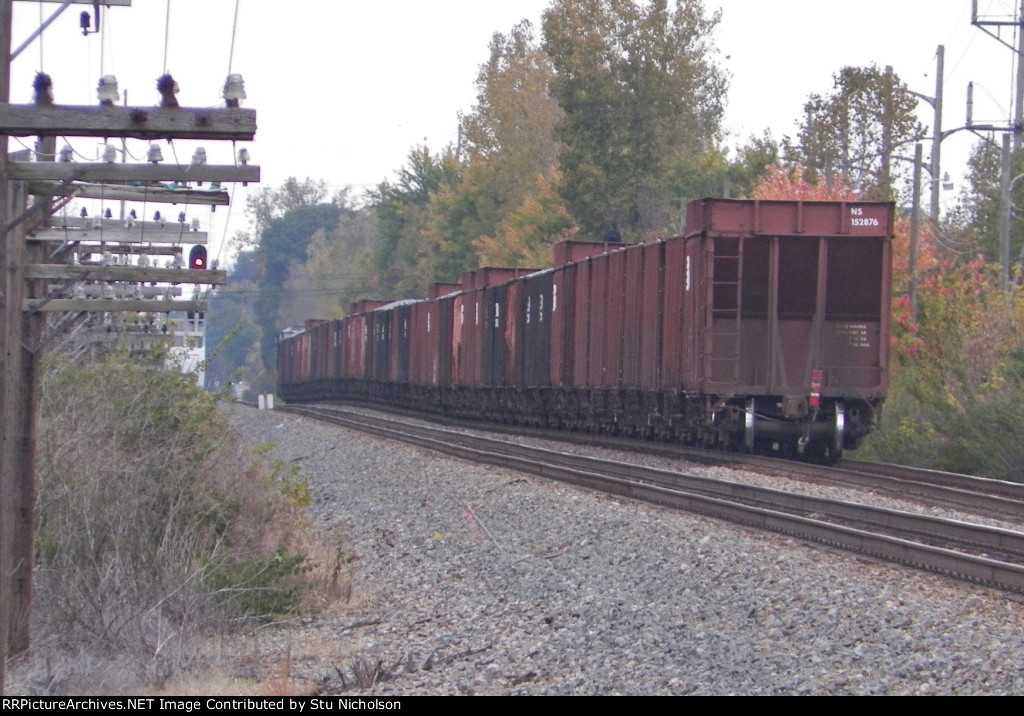 NS stone train approaching Cooke Road in N. Columbus