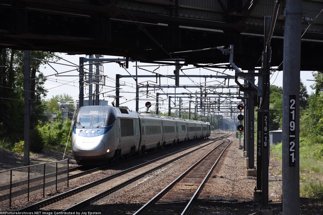 A northbound Acela is about to pass under the Franklin Line