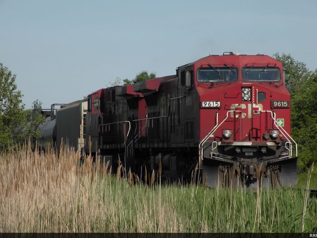 Eastbound CP ethanol train coming to a stop in the siding at Lovekin.