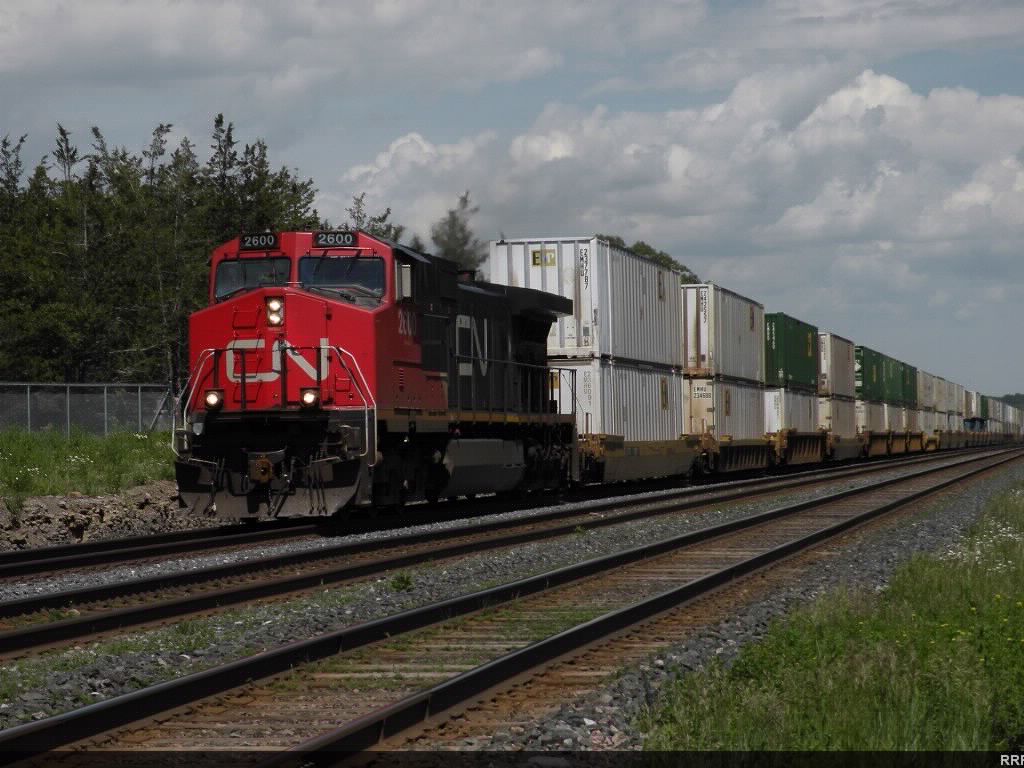 Westbound CN one unit wonder intermodal about to cross Shannonville Road.
