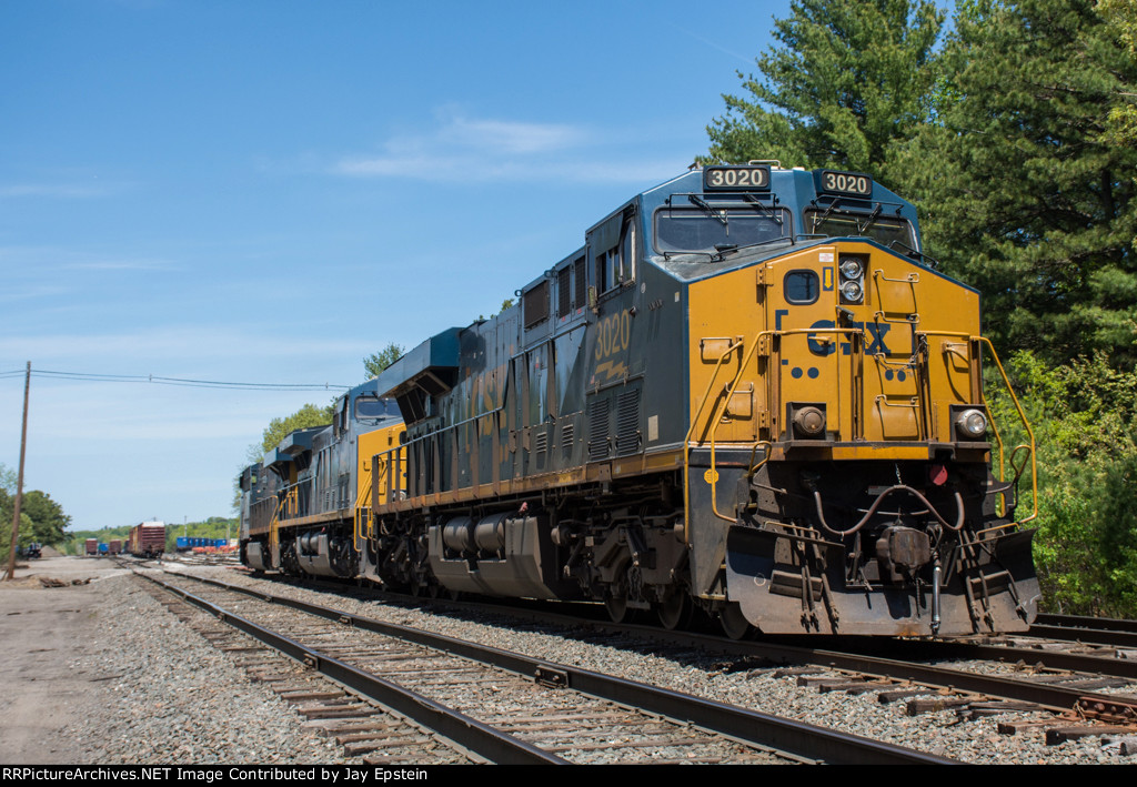 CSX 3020 and two other GE's wait for their coal hoppers to return