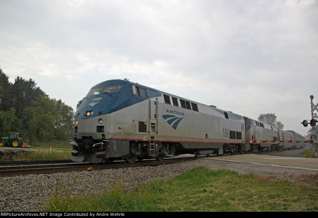 AMTK 186 fronts Number 8 across Co. Hwy. T