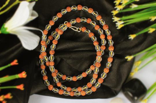 Sphatik diamond cut and Rudraksha mala in thread with silver flowers