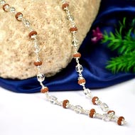 9 mukhi Rudraksha and Sphatik beads Mala in silver flower caps
