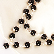 Black Agate mala in pure silver flower caps