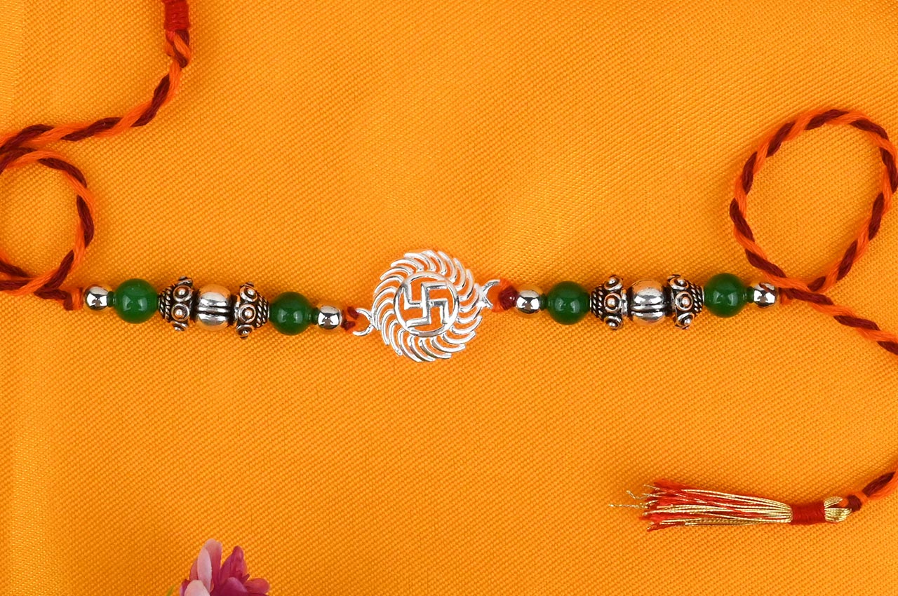 Buy Swastik Design Rakhi in Pure Silver in thread - II - Rudra Centre