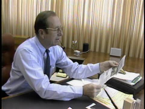 Illustrated Daily; Library Footage: PNM Building and Employees ...