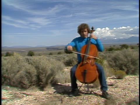 Illustrated Daily; 94; Library Footage, Tom Mcveety, Cellist, Playing ...