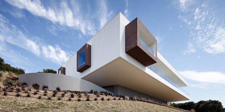 8 Houses That Were Built In Impossible Places - AsViral