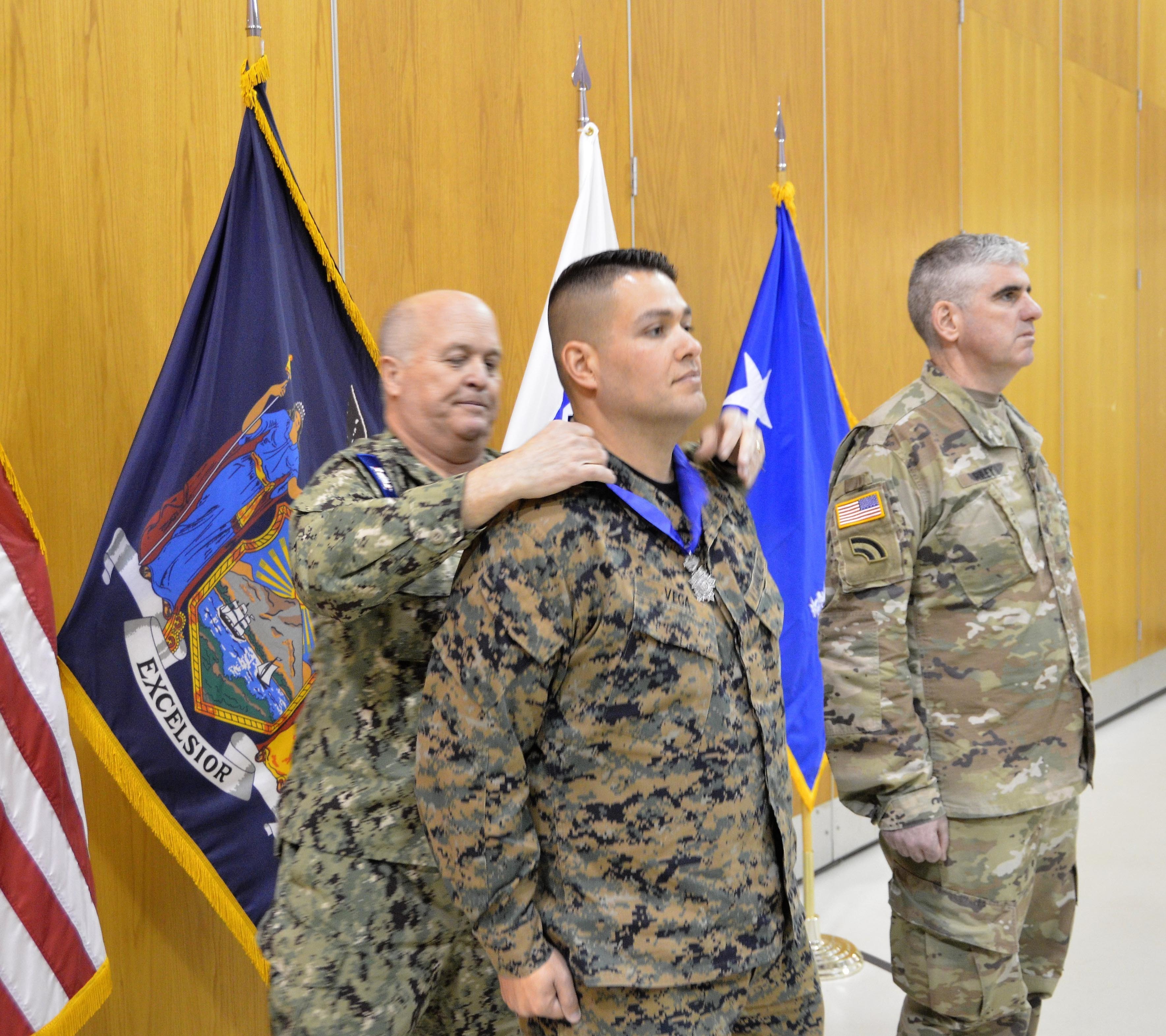 NY Naval Militia Sgt. Christopher Vega, a Peekskill resident, receives ...