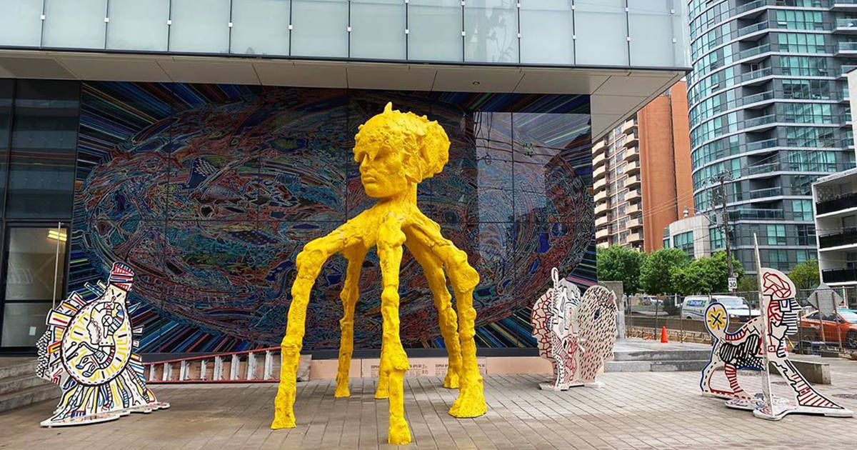 Creepy alien sculptures have just popped up outside a Toronto condo