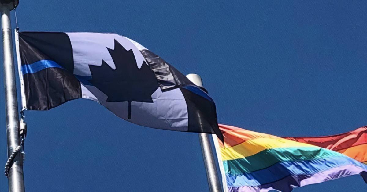 Black and blue Canadian flag on display at Ontario police building ...