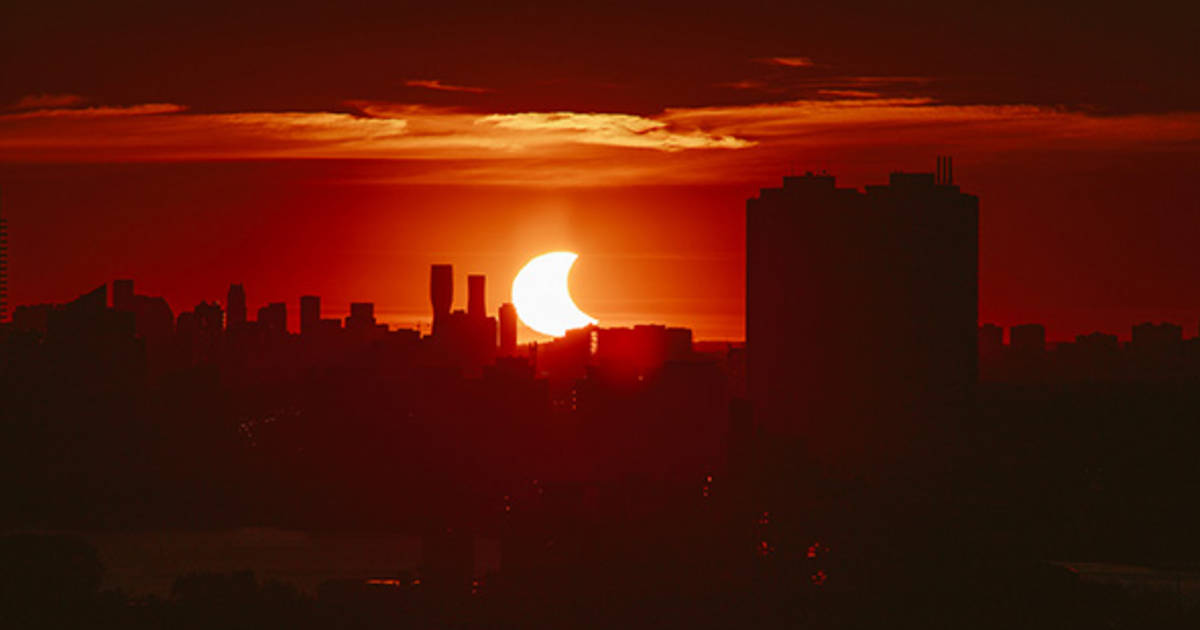 Partial solar eclipse over Toronto