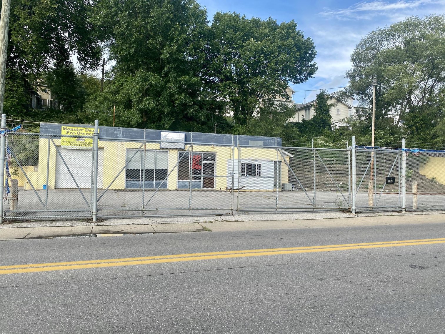 Fenced Commercial Lot Sold to the Highest Bidder