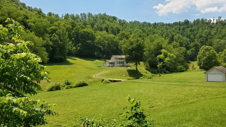 110+/- Acre Farm with Well Maintained Home