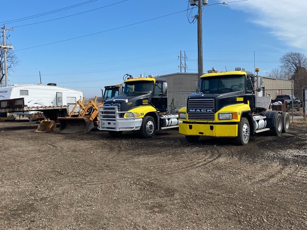 Construction Equipment: Trucks, Trailers, Backhoe