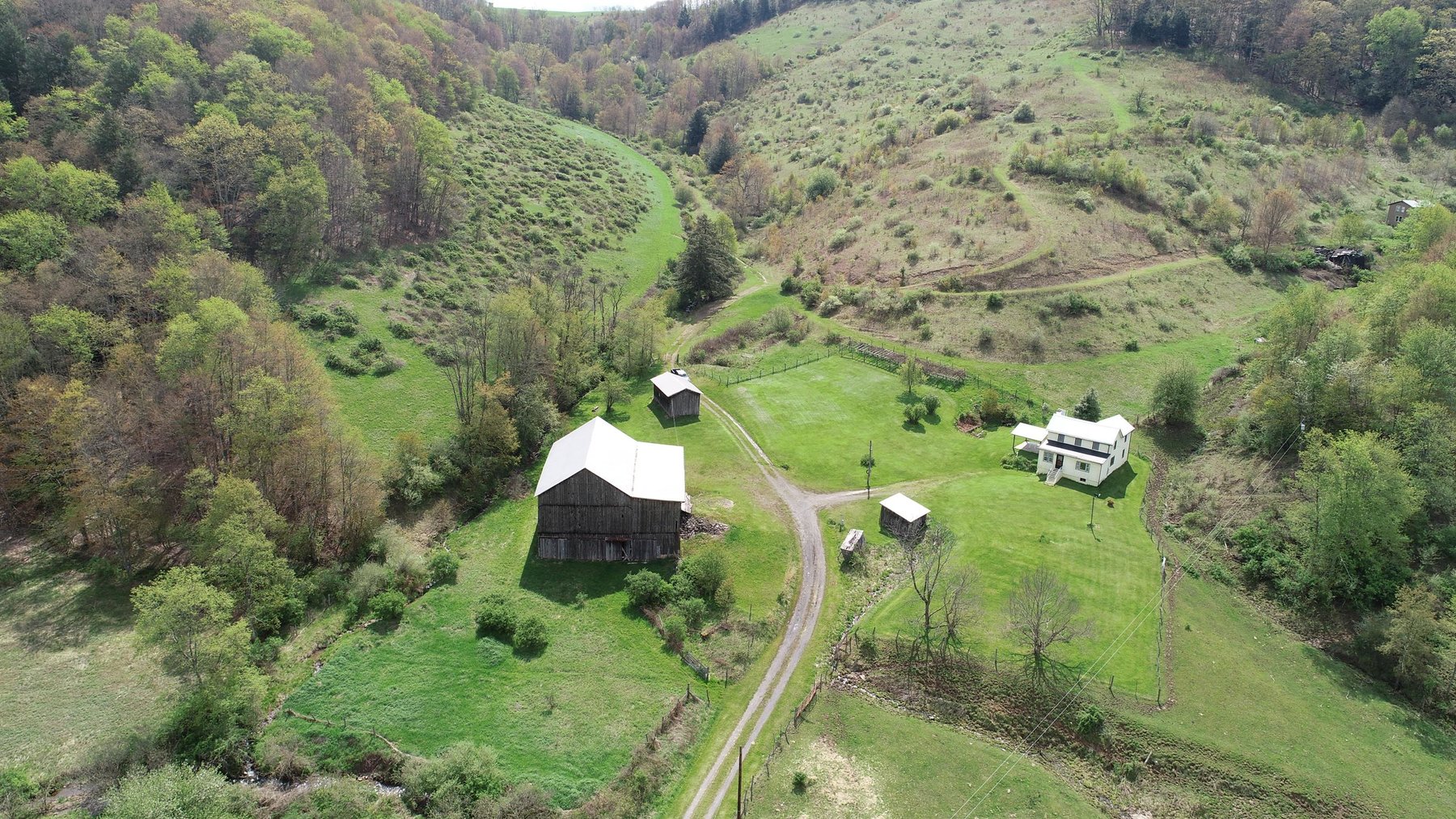 55-Acre Farm with Well-Maintained Home