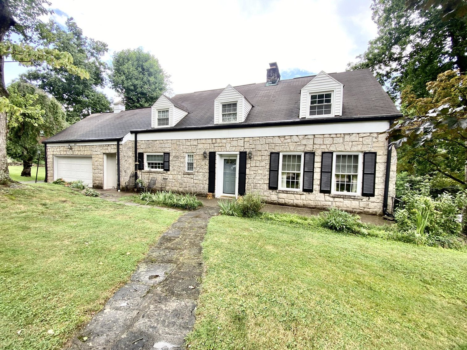 Charming 4 Bedroom Stone Cape Cod
