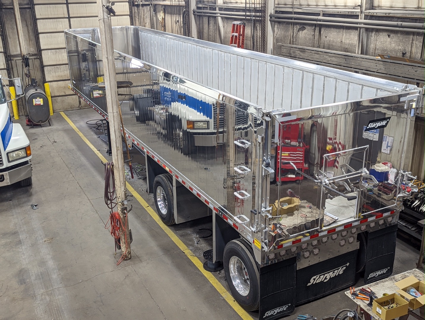 New dumps,flats, steps and tag a longs in stock