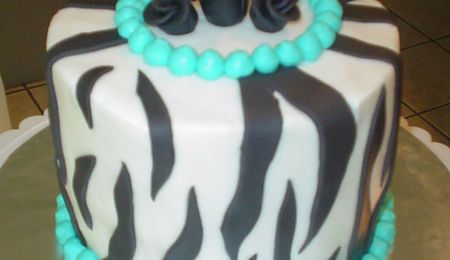 Zebra Print Cake With Ruffle Flowers - CakeCentral.com