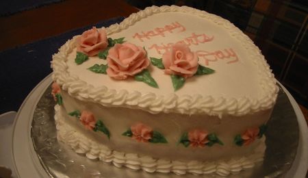 Rainbow 6 Inch Cake With A Red Yellow Green And Blue Layer Iced In ...