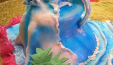 Sailboat Birthday Cake With Gradient Colored Waves - CakeCentral.com