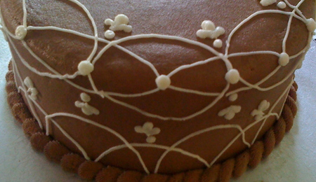 Stringwork Baby Cake - CakeCentral.com