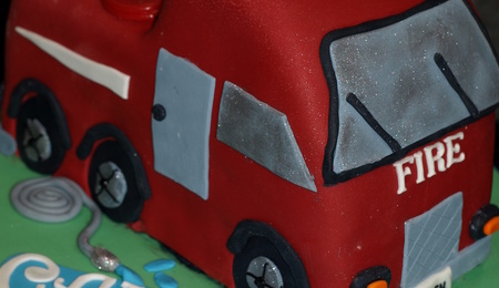 3D Fire Truck Cake Riding On Donut Wheels - CakeCentral.com