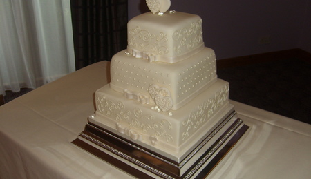 Red Scroll Wedding Cake - CakeCentral.com