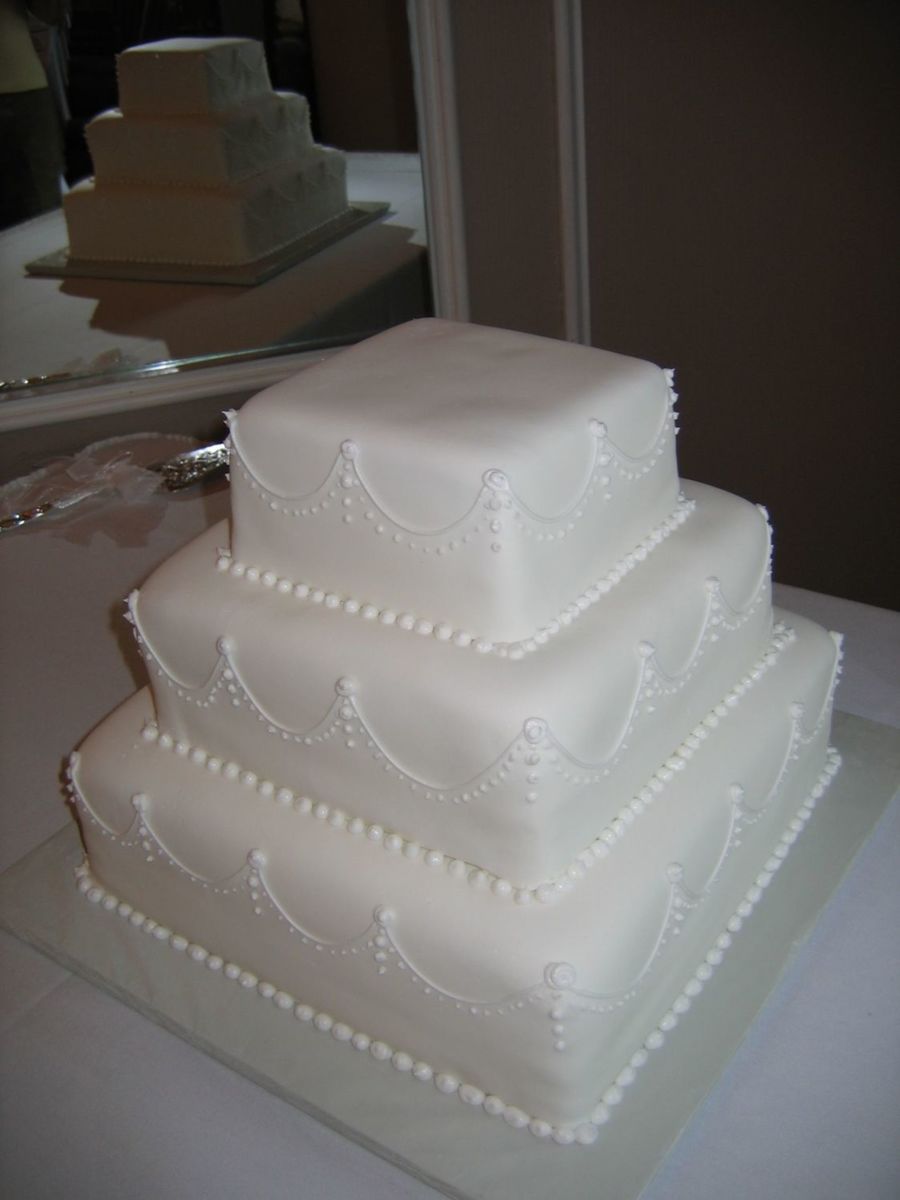 Fondant Wedding Cake With Buttercream Stringwork - CakeCentral.com