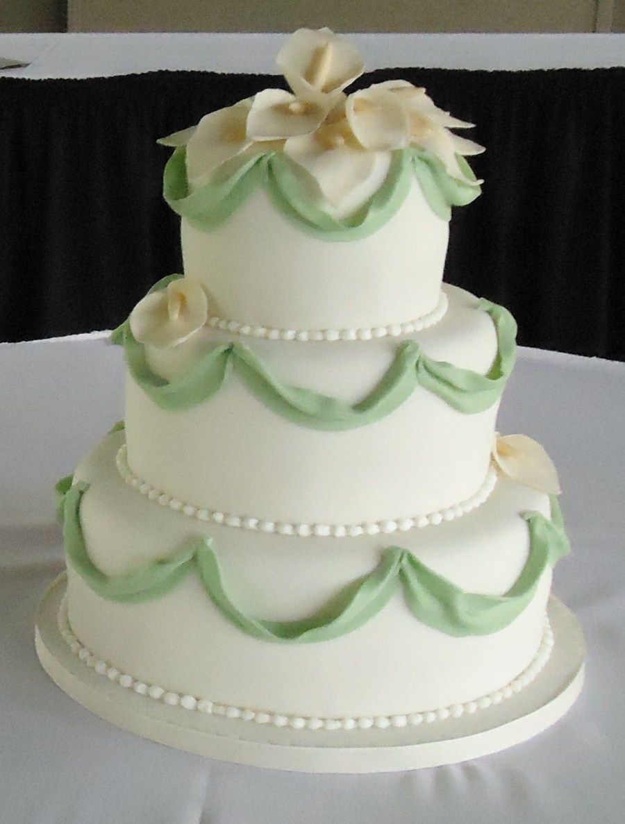 Green Fondant Swag Cake - CakeCentral.com