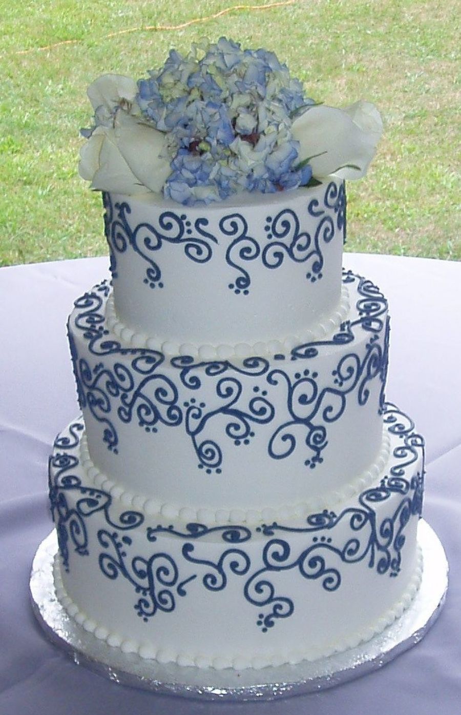 Navy Blue Scrolls & Fresh Flowers - CakeCentral.com