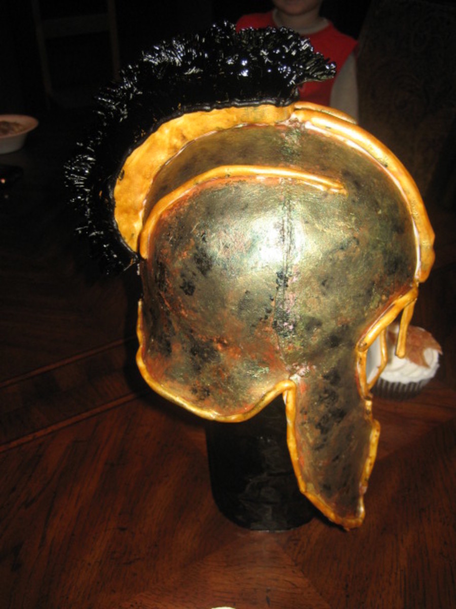 Spartan Helmet Cake & Cupcakes - CakeCentral.com
