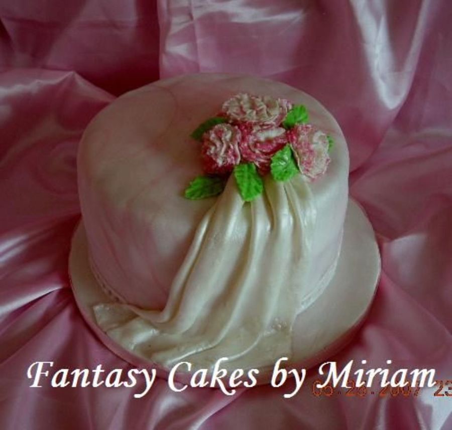 My_First_Draped_Cake-A.jpg - CakeCentral.com