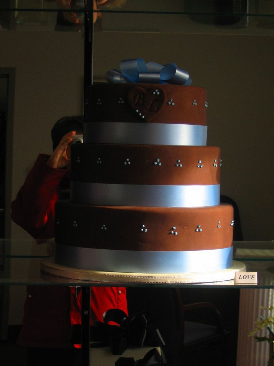 Chocolate Fondant With Blue Ribbon - CakeCentral.com