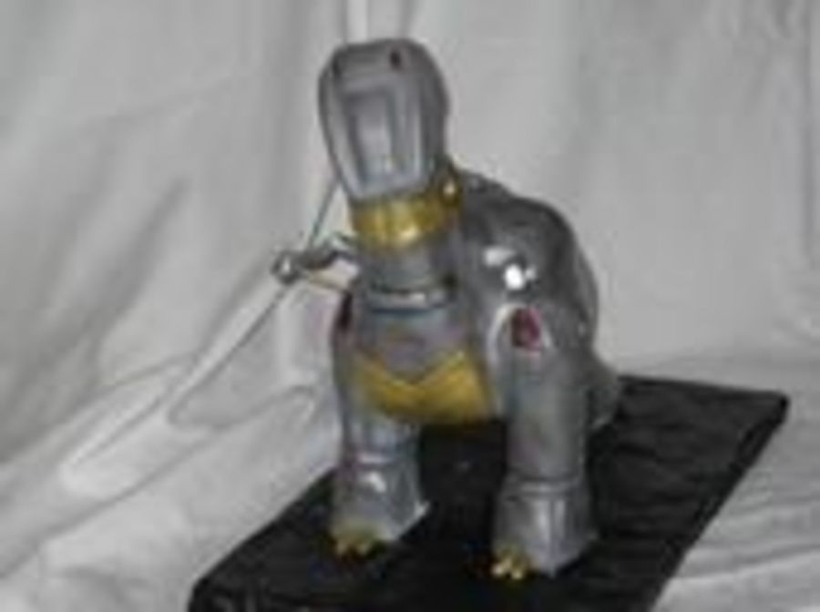 Dinobot Transformer Cake - CakeCentral.com