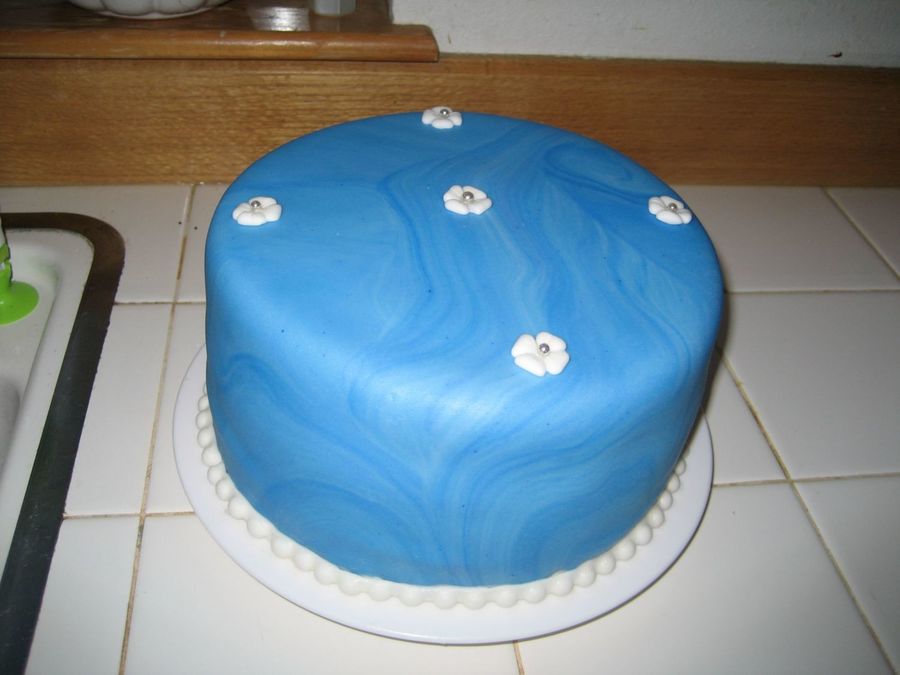 Blue Surfing Cake - CakeCentral.com